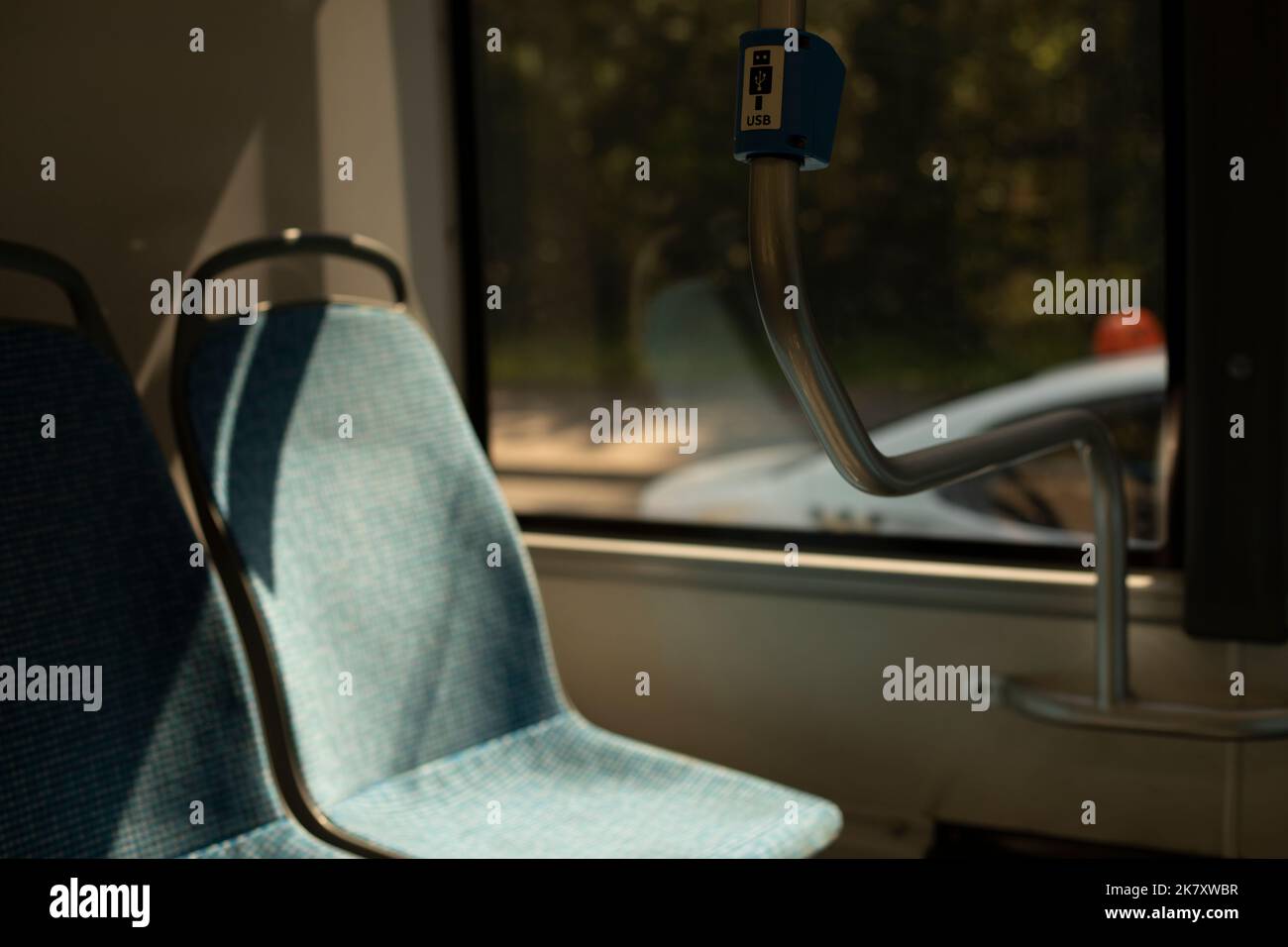 Sitting on bus. Public transport details. Blue passenger seat. Interior ...
