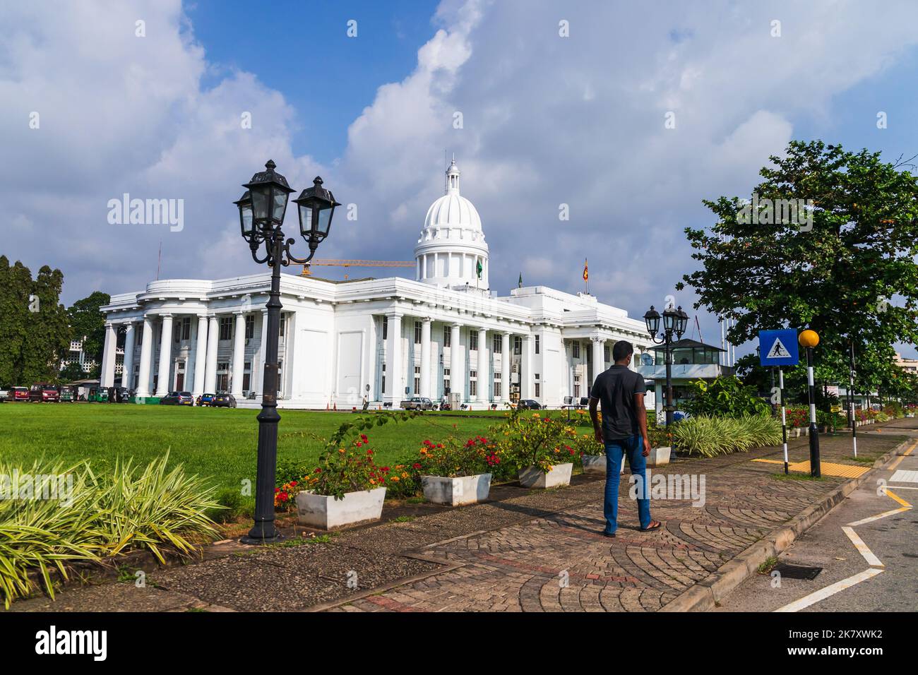 Colombo, Sri Lanka - December 3, 2021: A man walk near the Town Hall of ...