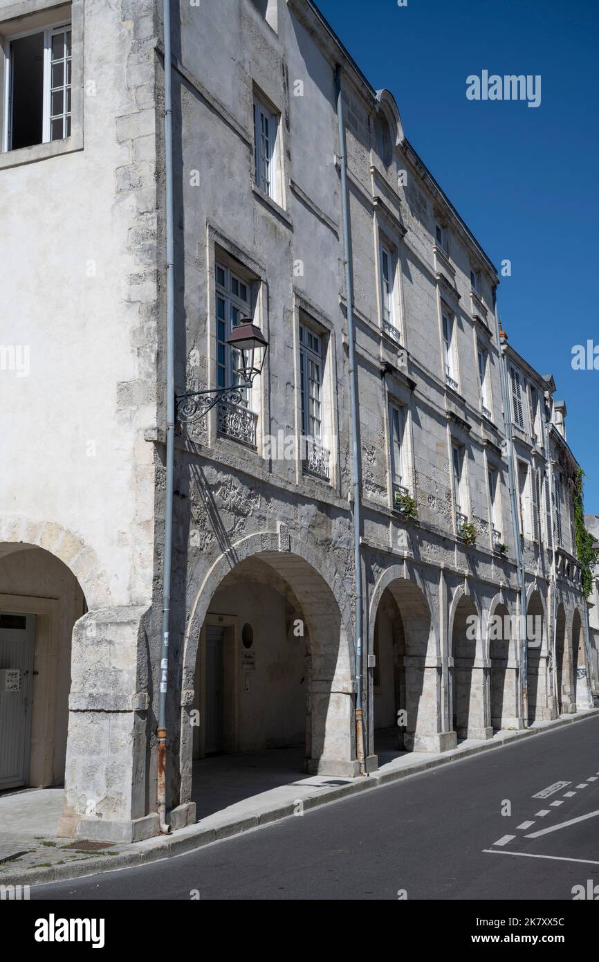 Ancient stone archways in the old quarter of La Rochelle, Charente ...