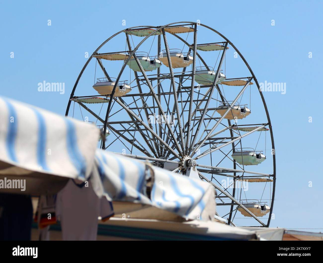 Ferris wheel of the funfair during the fair in the country Stock Photo ...