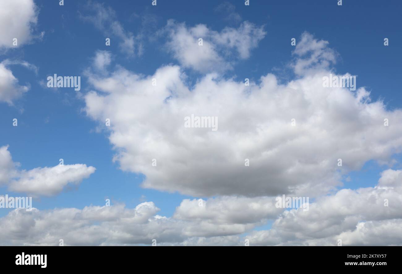 light blue background with high white clouds on a spring day Stock ...