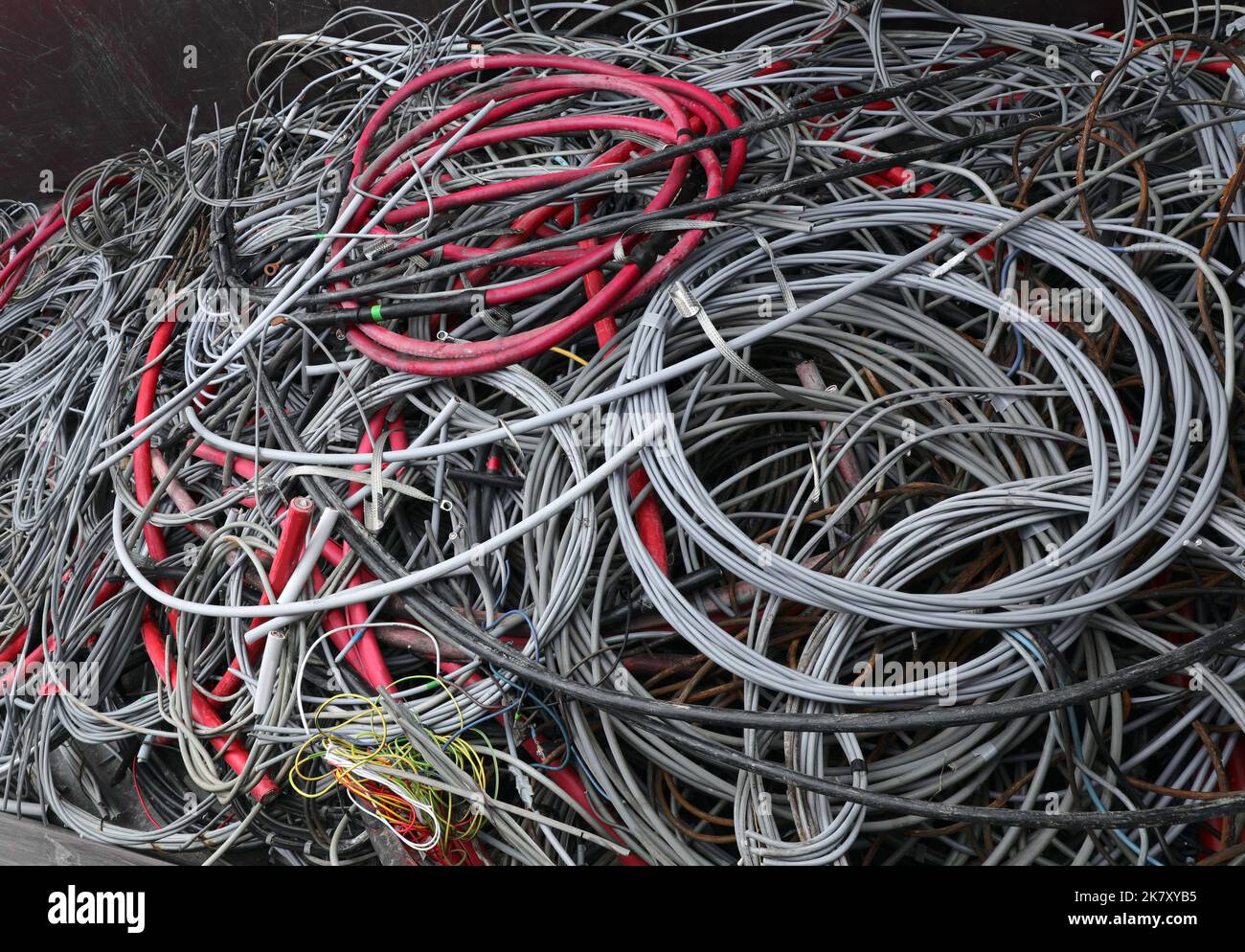 tangles of old used electrical cables in the landfill to be recycled ...