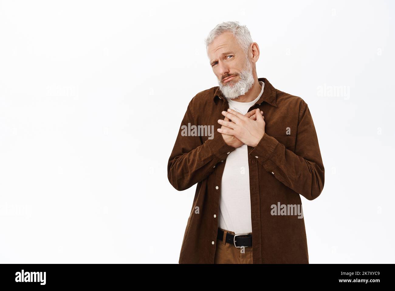 Image of senior guy, old man being touched, holding hands on chest ...
