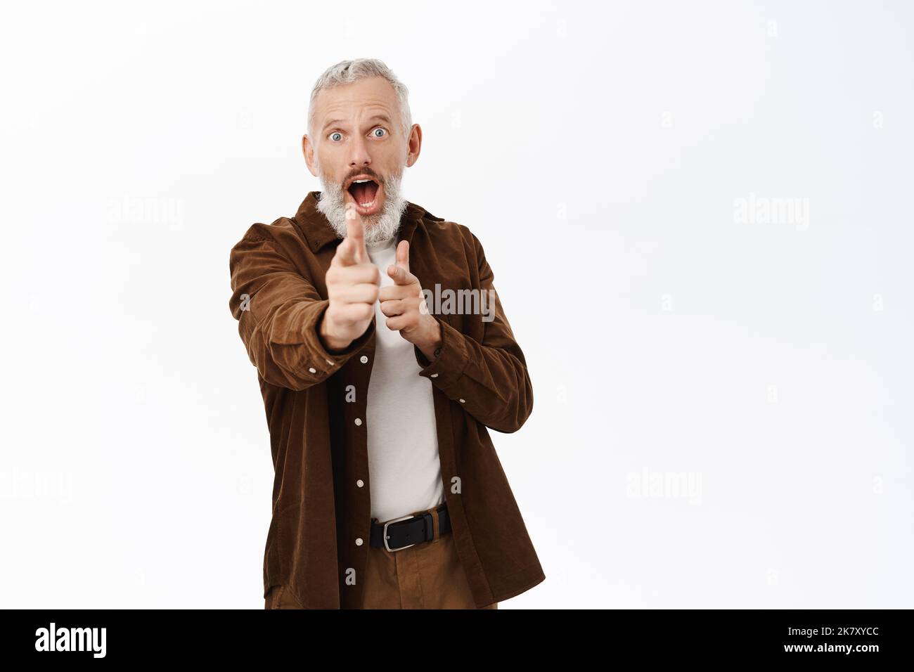 Shocked old man, mature guy pointing fingers at you camera, drop jaw ...