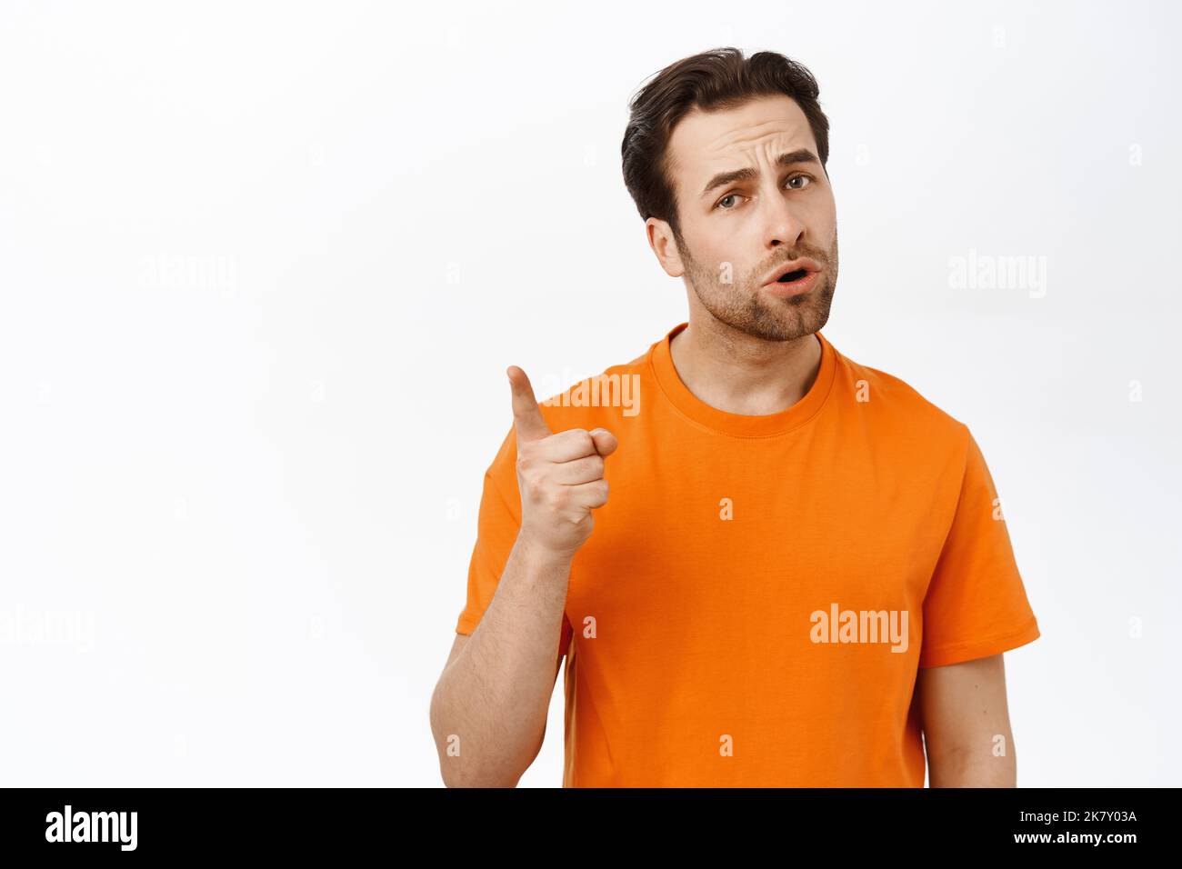 Portrait of man shaking finger in disapproval, scolding someone ...