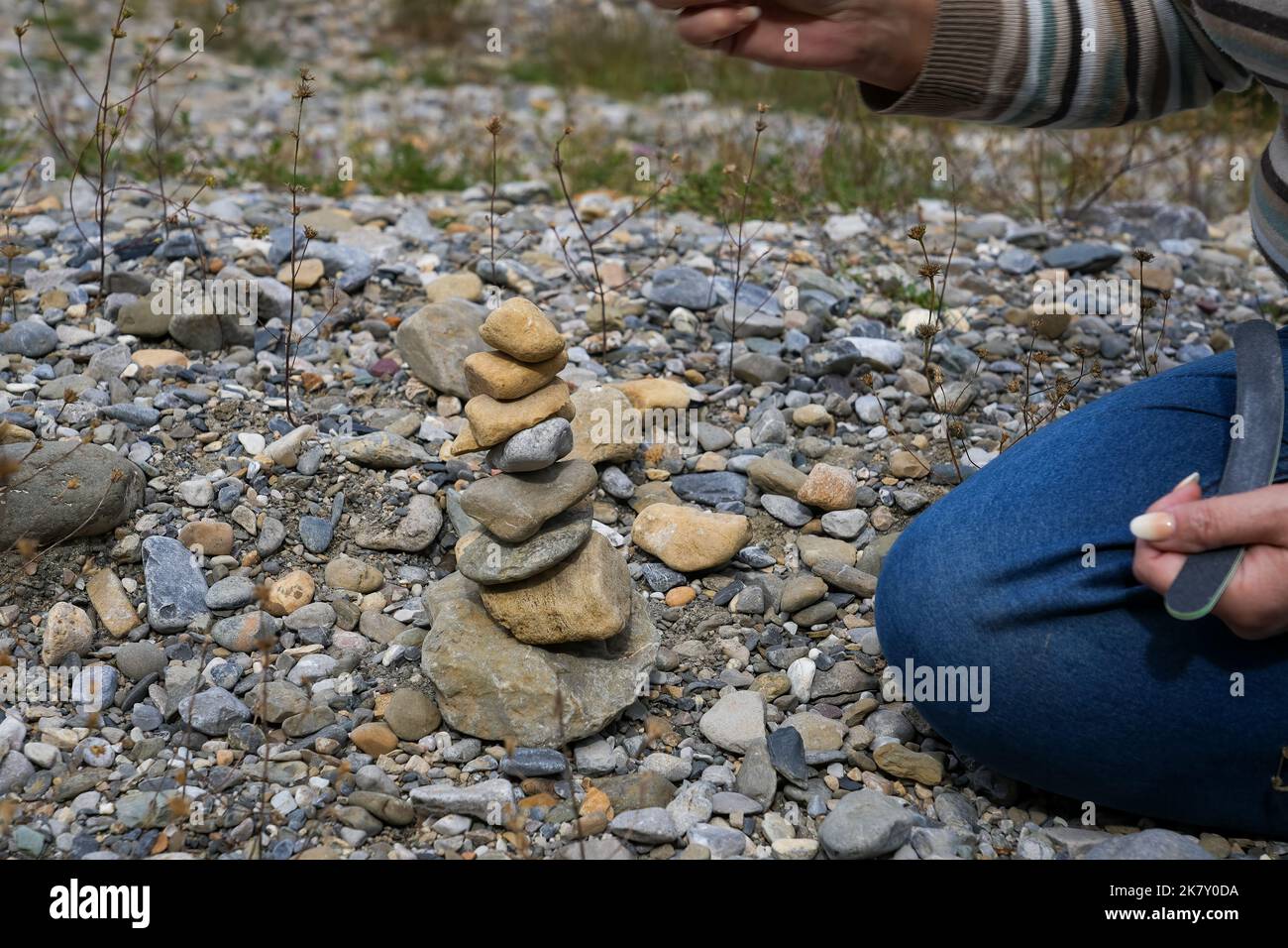 close-up of a hand-built mini tower of rover stones and pebbles Stock ...