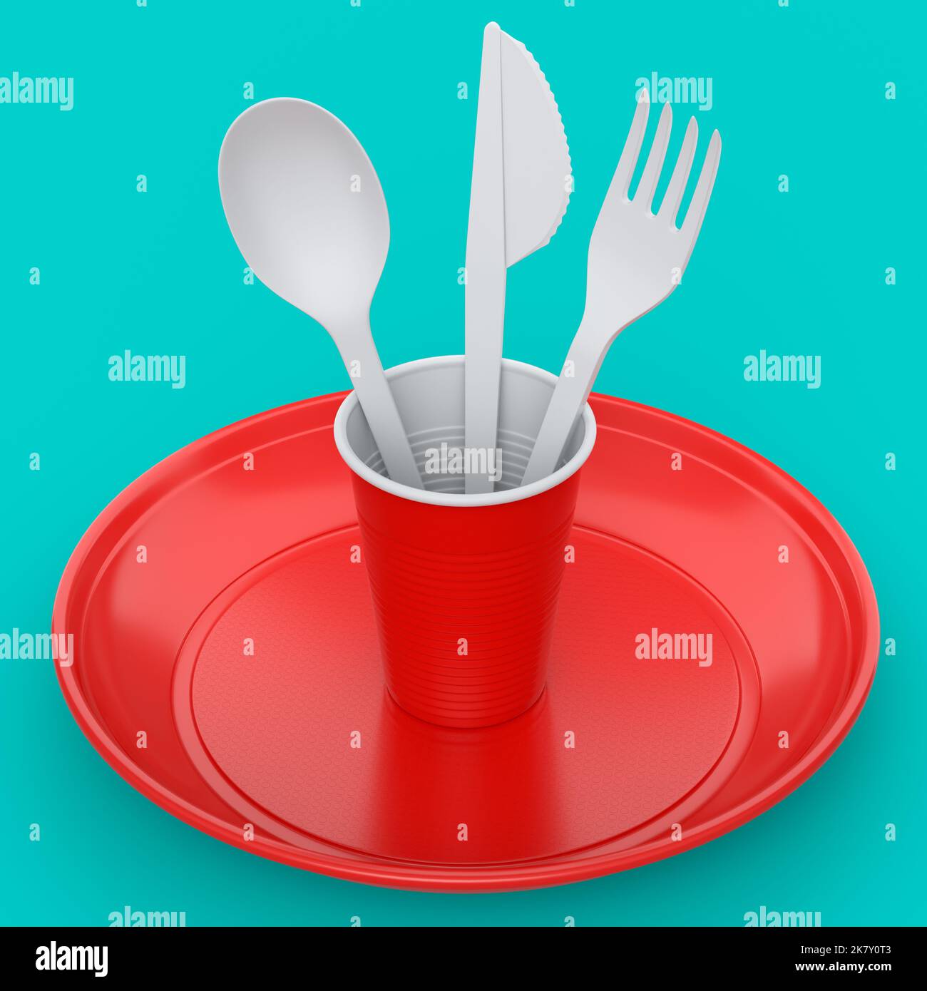 Set of disposable utensils like plate, folk, spoon,knife and cup on ...