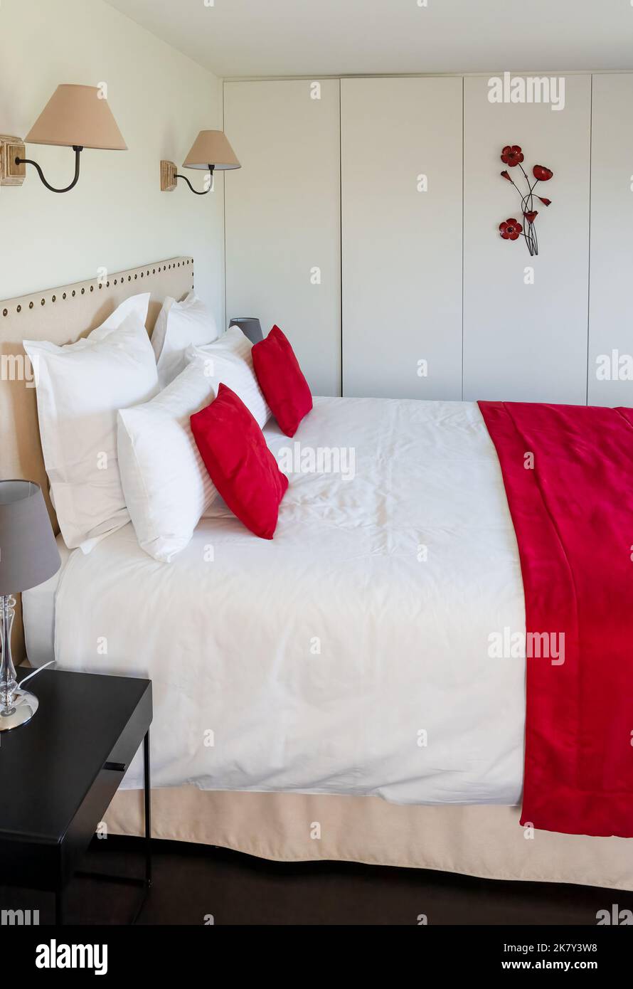 stylish contemporary french chambre d'hote bedroom with red and white ...