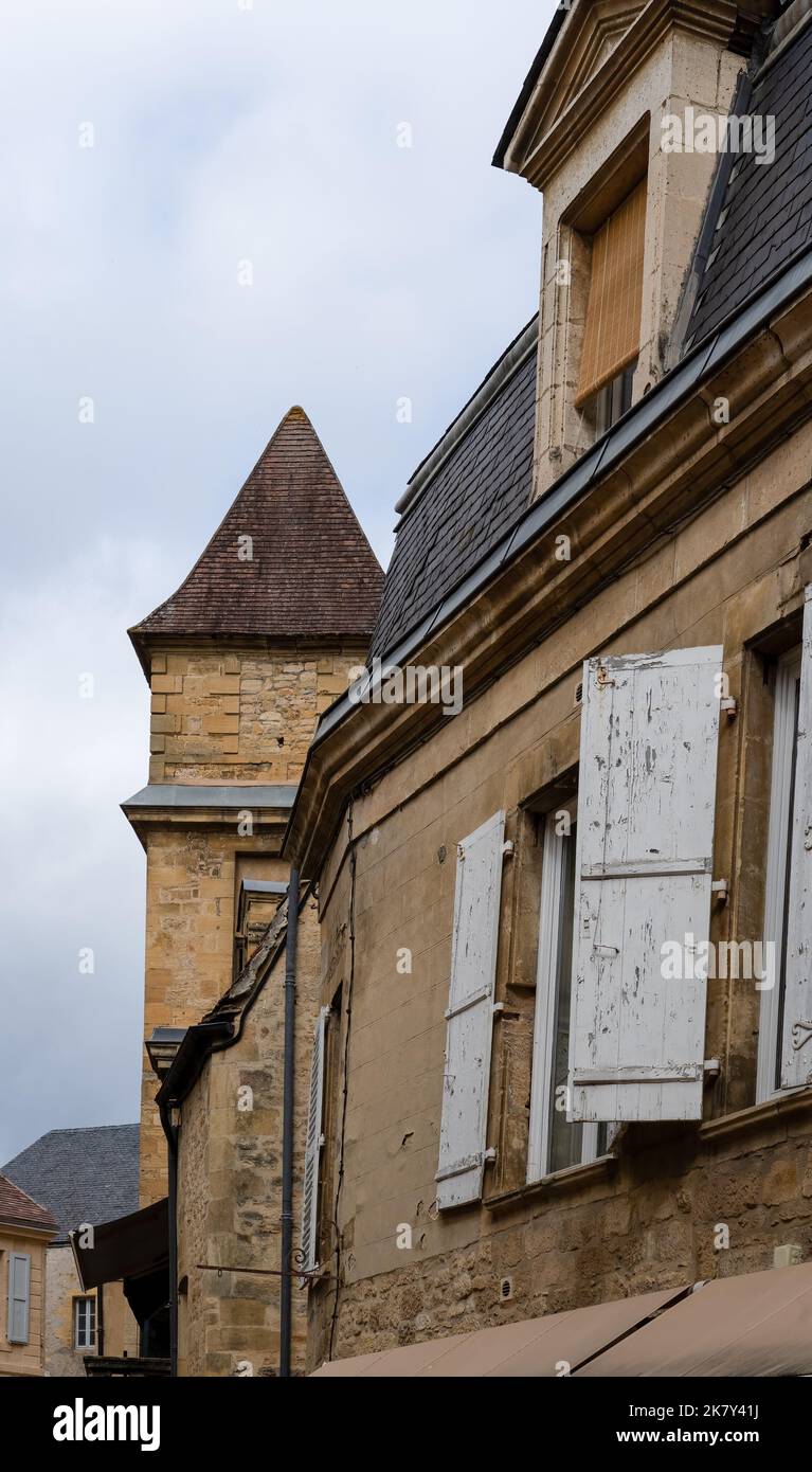 view between old stone walls and buildings of a beautifully preserved ...