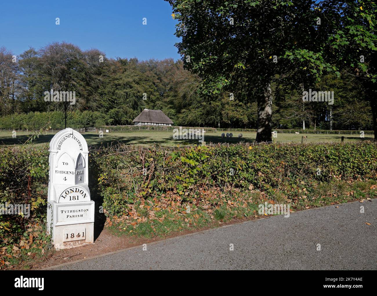 Milestone and view across fields with sheep, St Fagans Museum of ...