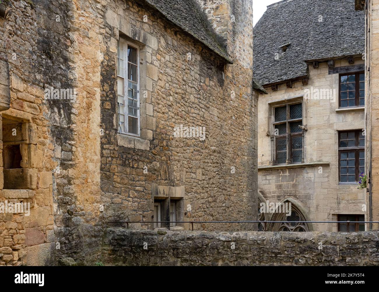 view of 14th century medieval town buildings in Sarlat-la-Caneda ...