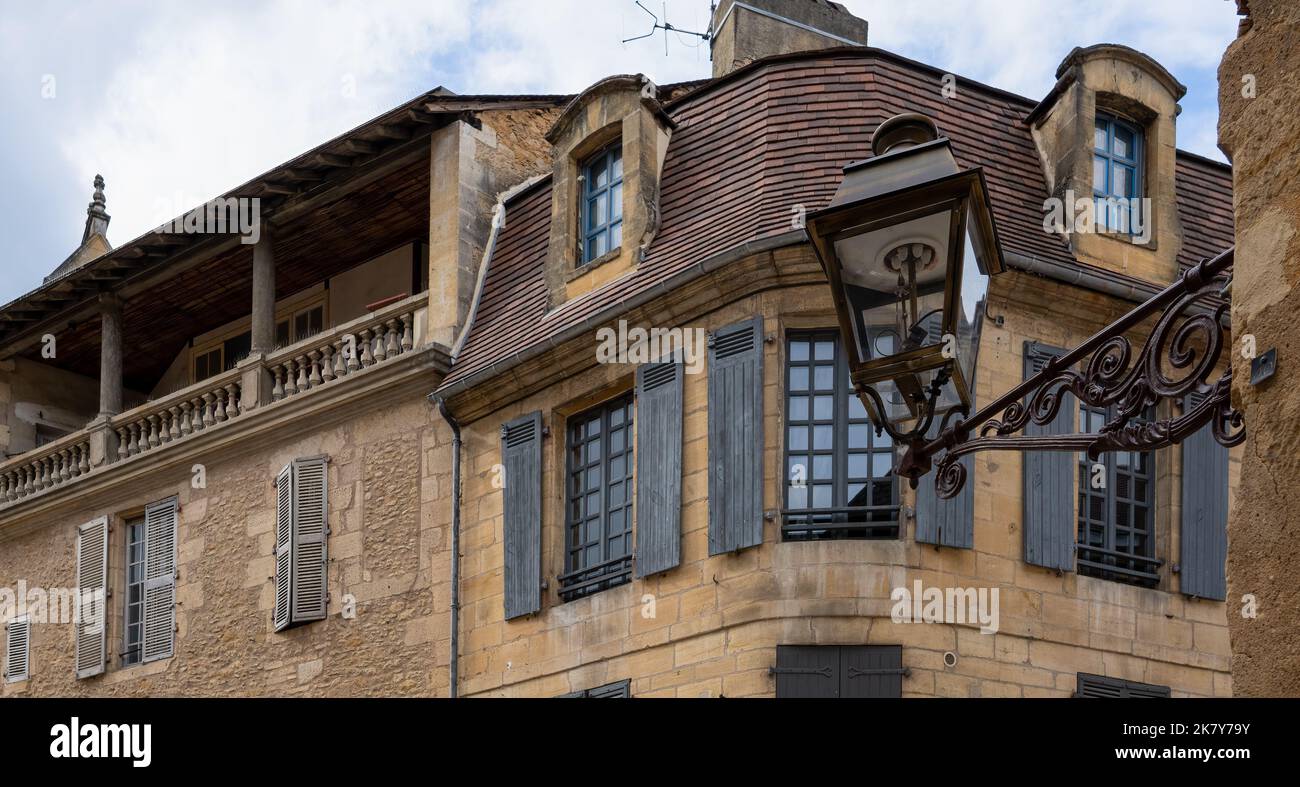 view between old stone walls and buildings of a beautifully preserved ...
