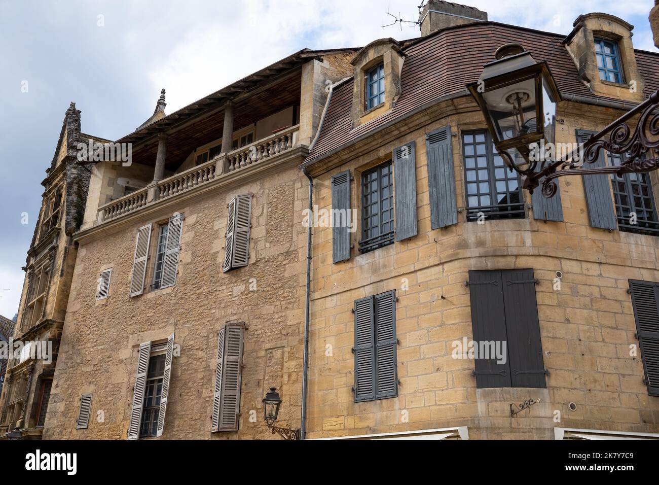 view between old stone walls and buildings of a beautifully preserved ...