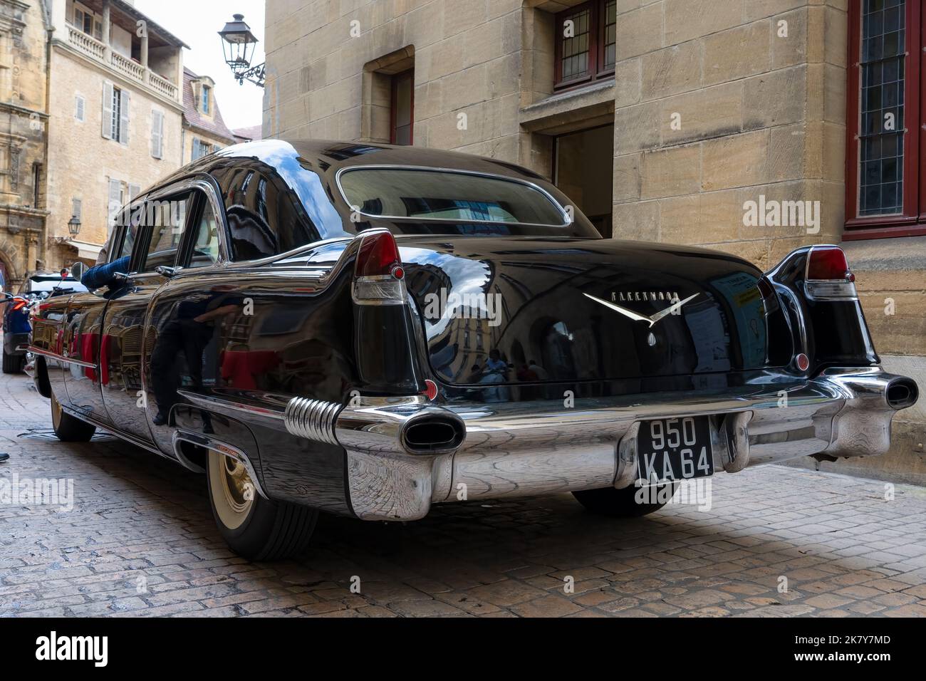 a classic America Cadillac Fleetwood awaiting entry to the Sarlat-la ...