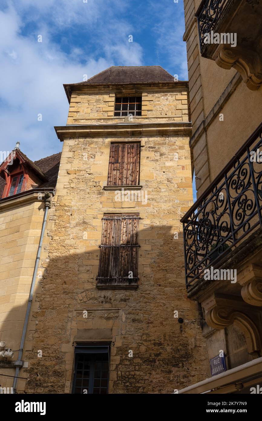 view between old stone walls and buildings of a beautifully preserved ...