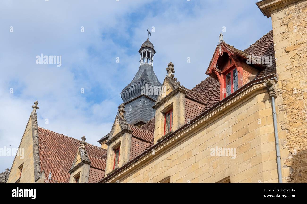view between old stone walls and buildings of a beautifully preserved ...