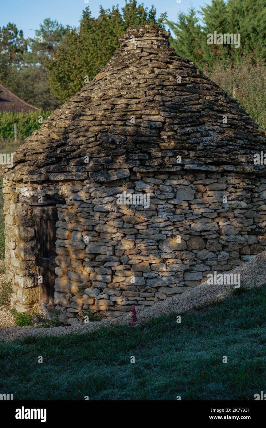 close up of an aged, round, hand built stone shepherd's hut Stock Photo ...