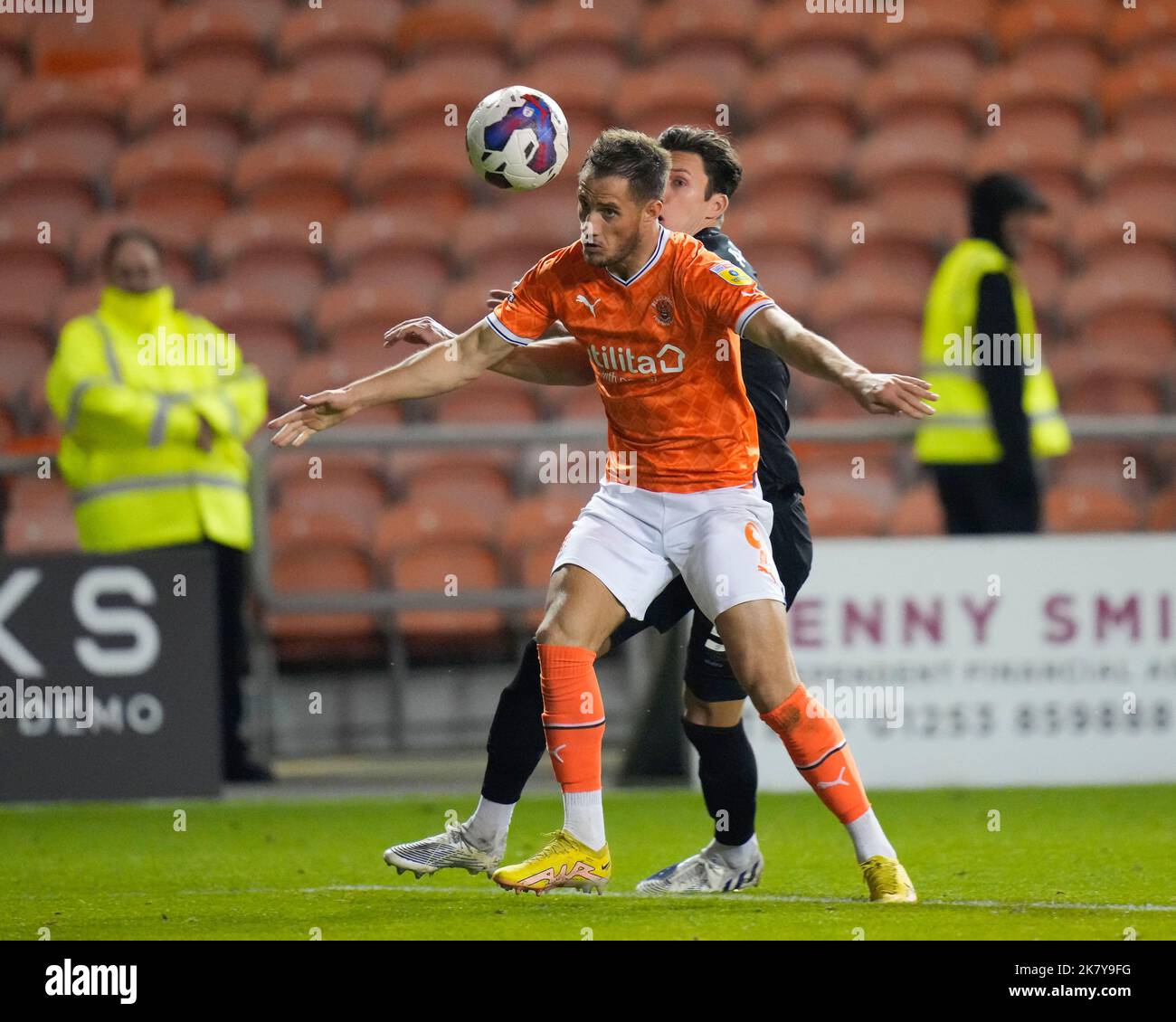 Jerry Yates #9 of Blackpool competes for a header during the Sky Bet ...