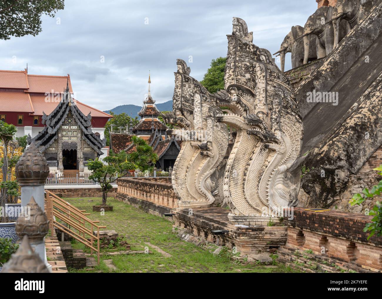 Base of main stupa with beautiful ancient naga and elephant stucco ...