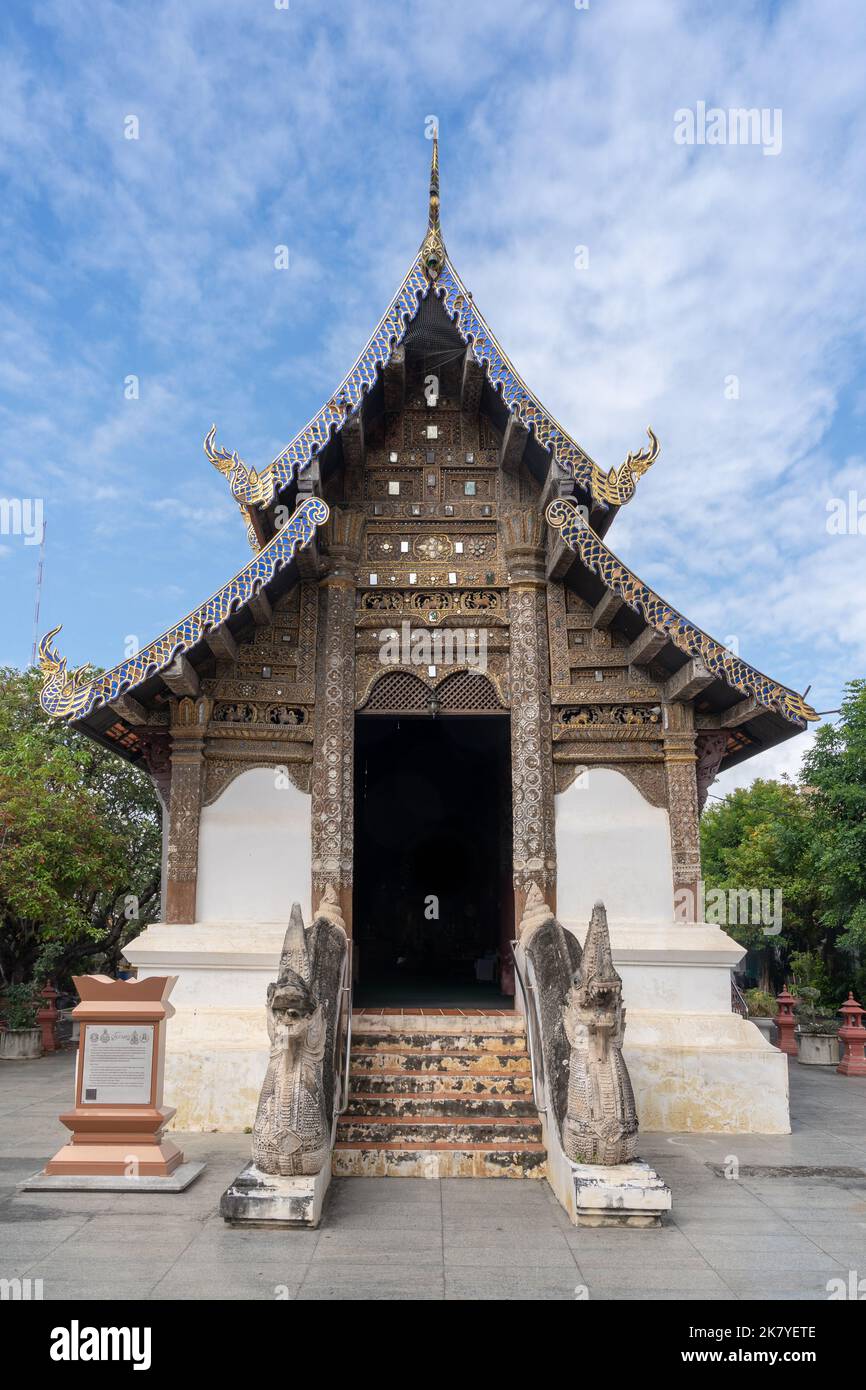 Front view of beautiful ancient Lanna style viharn inside compound of ...
