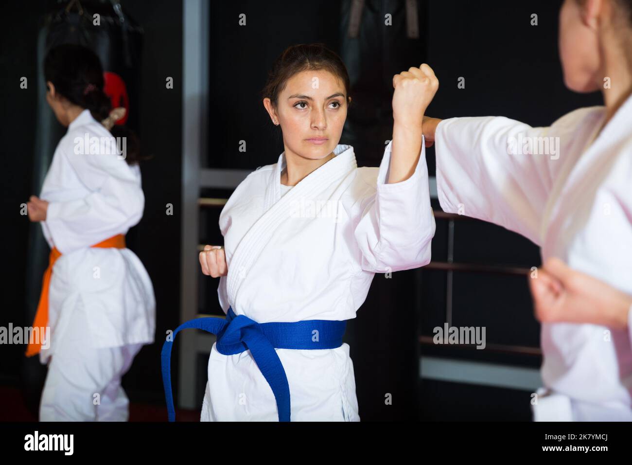Women fighting during group karate training in gym Stock Photo - Alamy