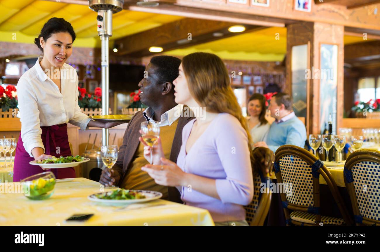 African waiter woman restaurant plate hi-res stock photography and ...