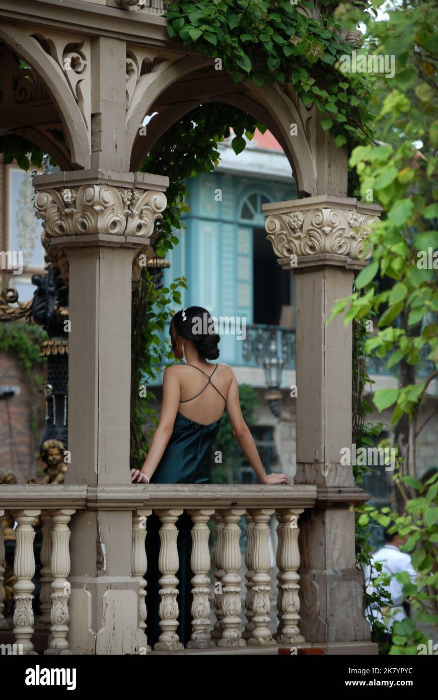 Model posing on balcony of Casa Juico’s, Las Casas Filipinas de Acuzar ...