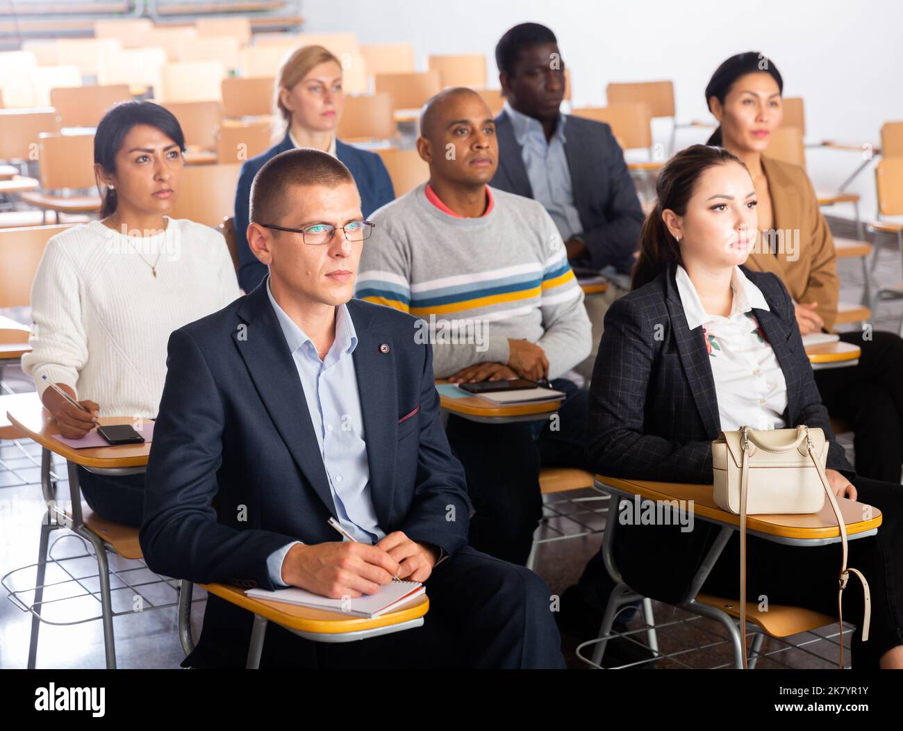 Audience attending seminar hi-res stock photography and images - Alamy