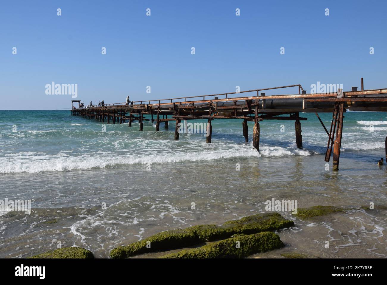 Fishermen on a Dock on Atlit Beach - Atlit Beach Reserve along Highway ...