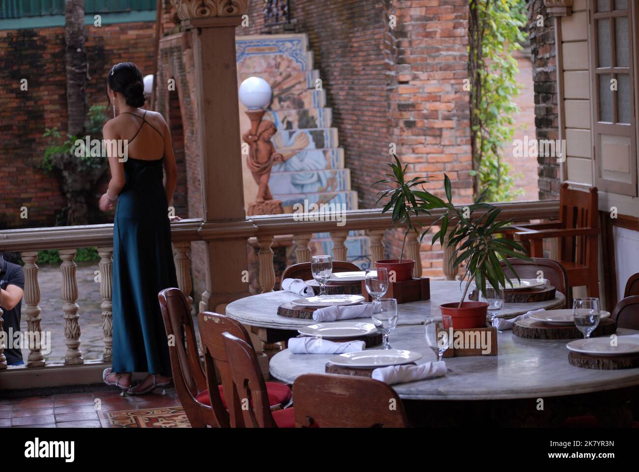 Model posing on balcony of Casa Juico’s, Las Casas Filipinas de Acuzar ...