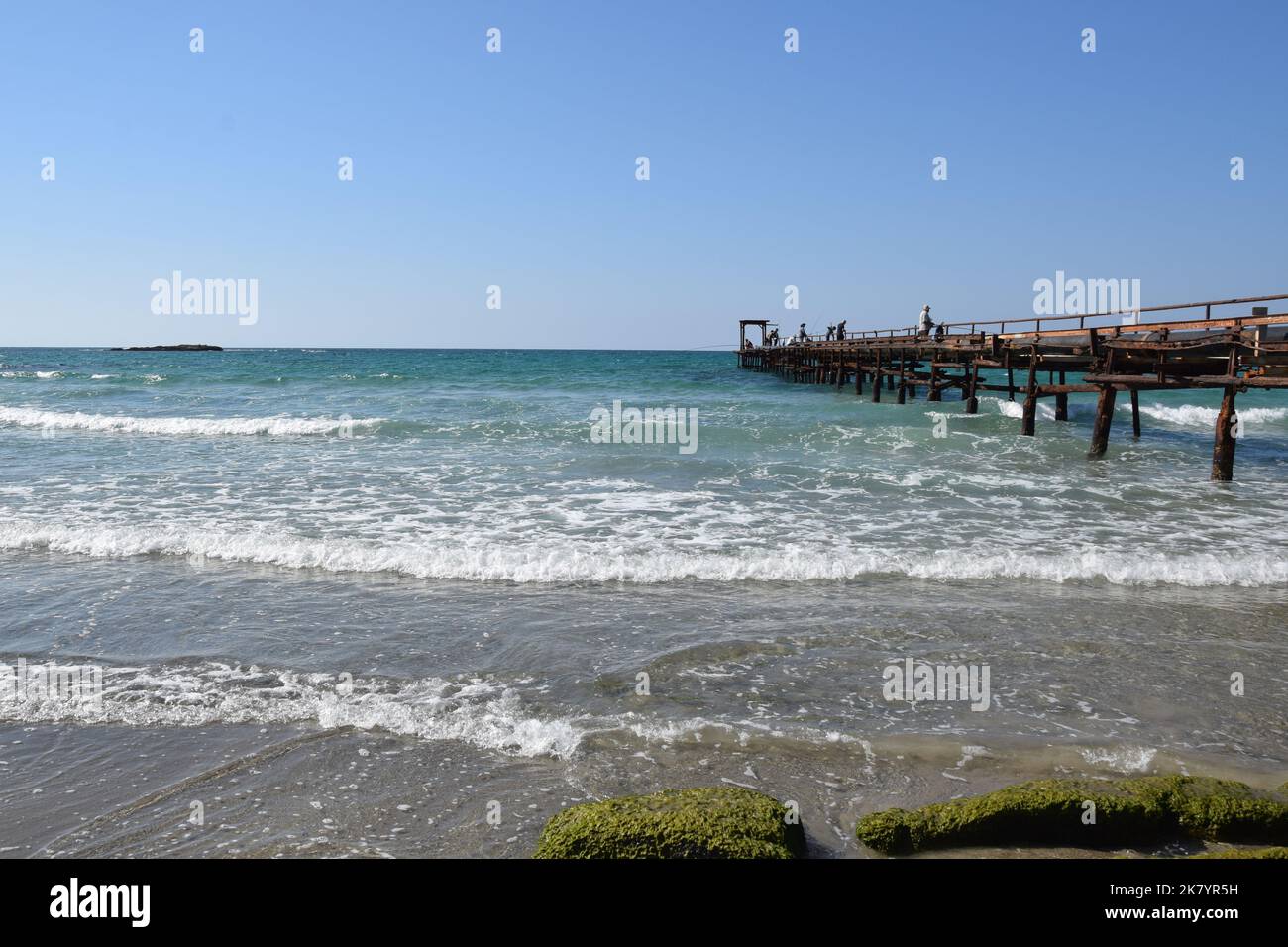 Fishermen on a Dock on Atlit Beach - Atlit Beach Reserve along Highway ...