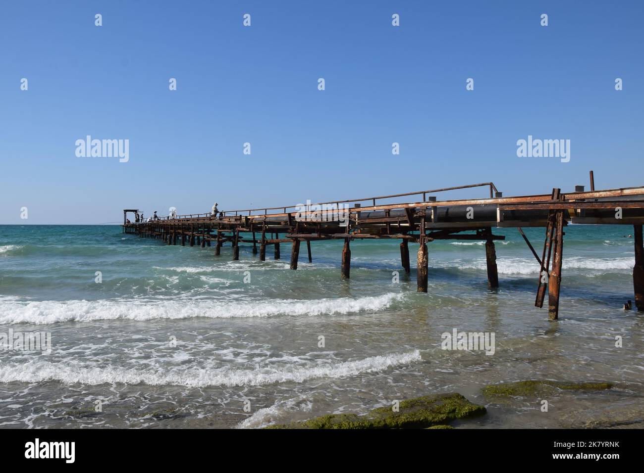Fishermen on a Dock on Atlit Beach - Atlit Beach Reserve along Highway ...