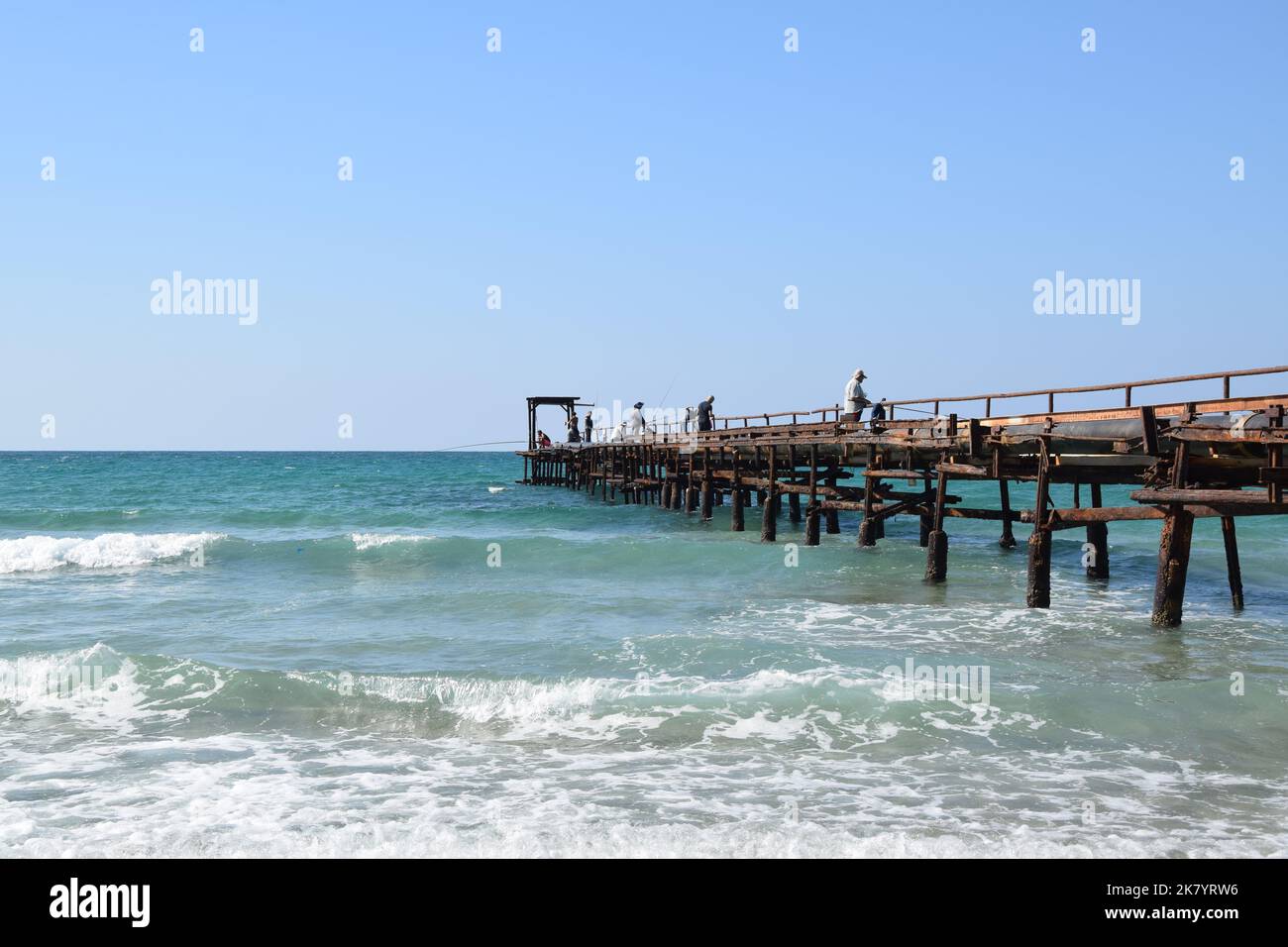 Fishermen on a Dock on Atlit Beach - Atlit Beach Reserve along Highway ...