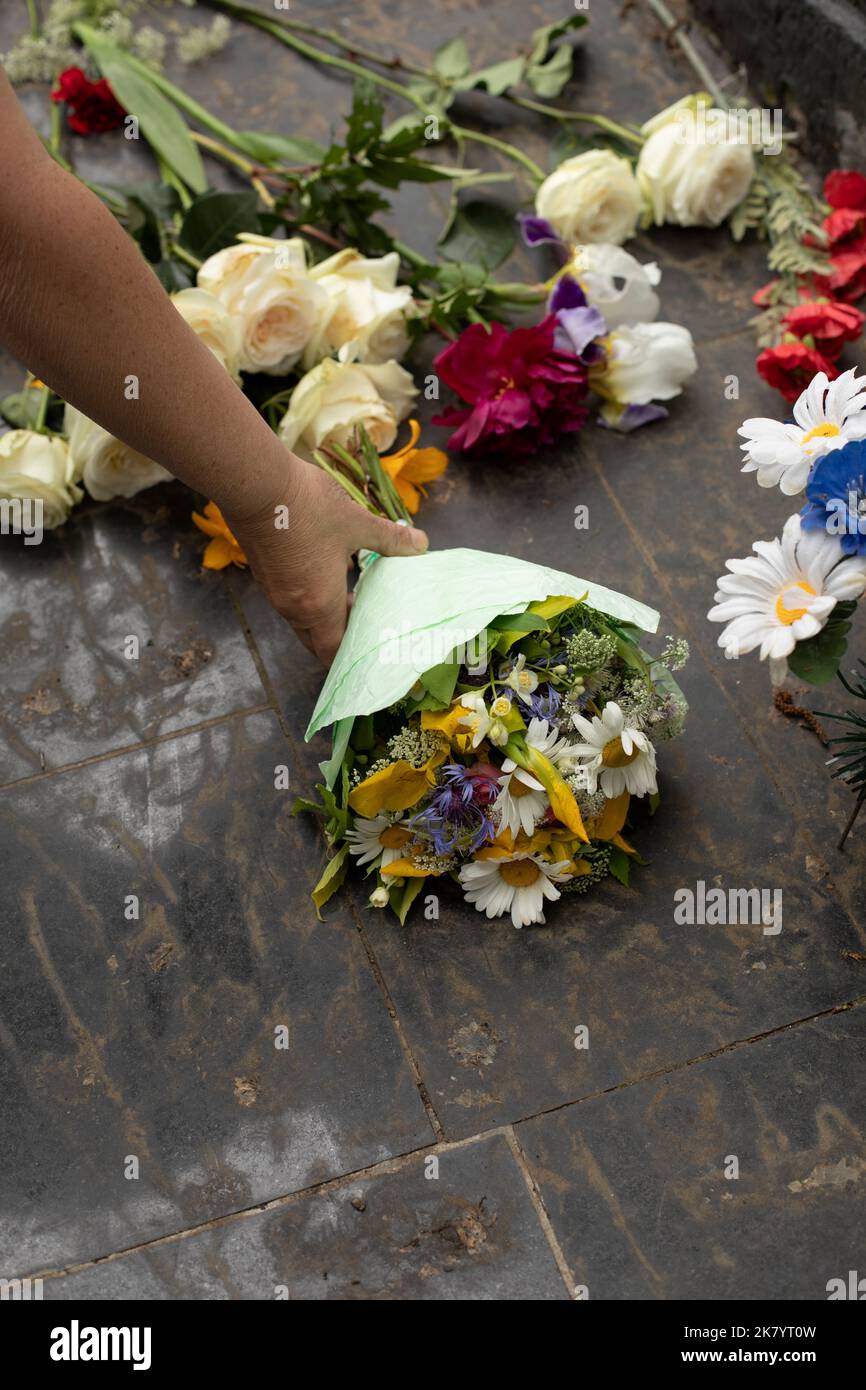 Flowers on grave. Details of ceremony. Remembrance of fallen soldier ...