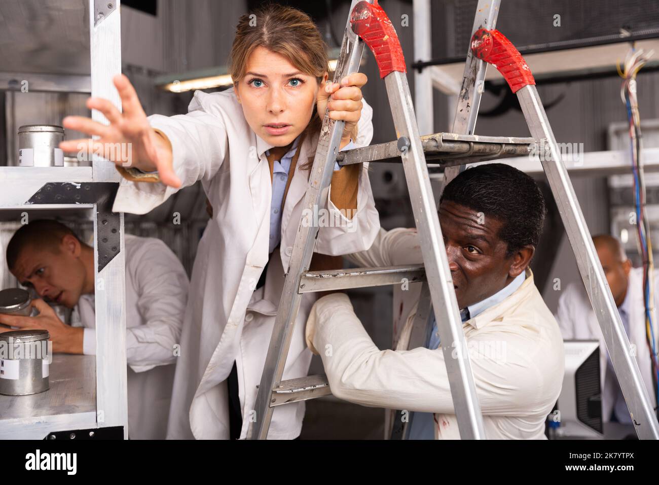 Portrait of european girl on ladder in quest room Stock Photo - Alamy