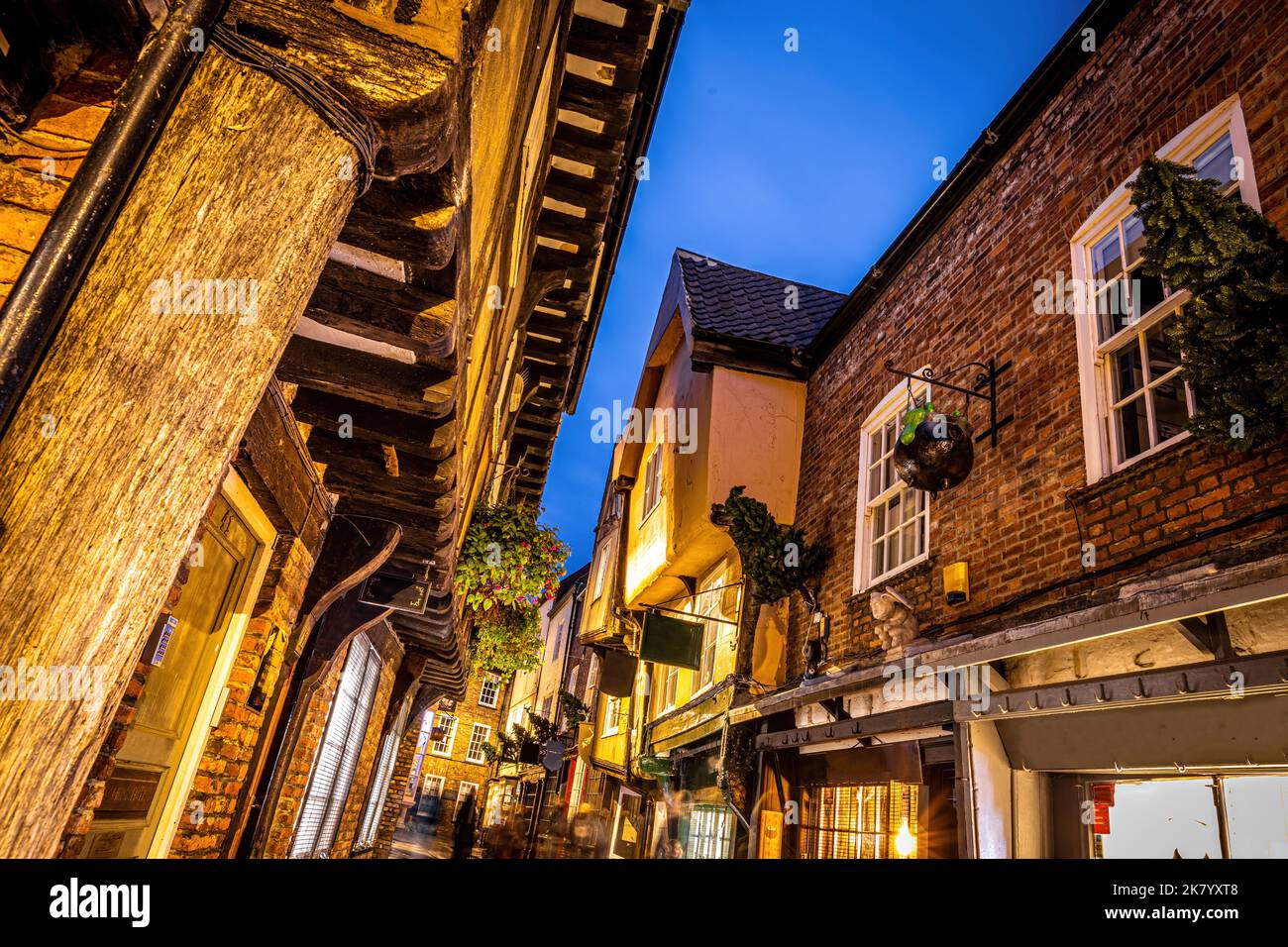 A Chirstmas night view of Shambles, a historic street in York featuring ...