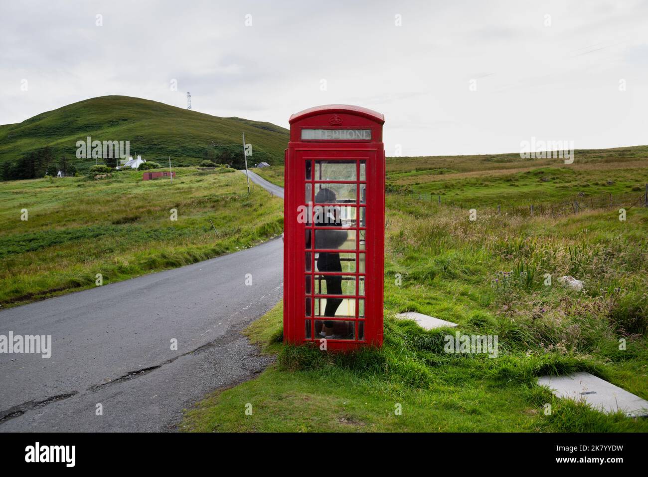 English phone booth in a village on the north of the Isle of Skye in ...