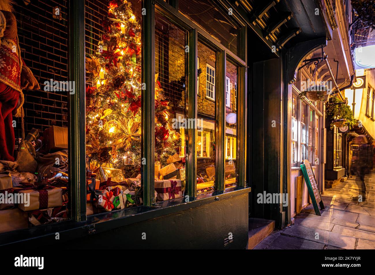 A Chirstmas night view of Shambles, a historic street in York featuring ...