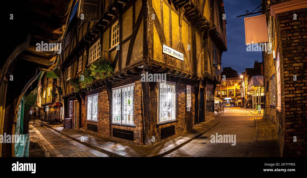 A Chirstmas night view of Shambles, a historic street in York featuring ...