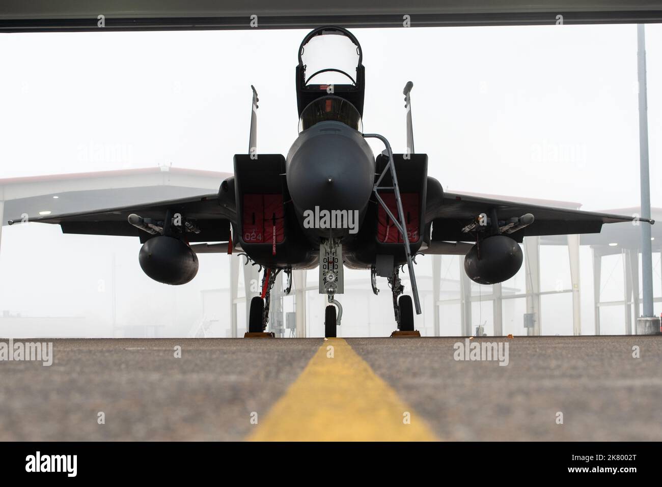 An F-15 from the 142nd Wing sits ready during a foggy morning at ...