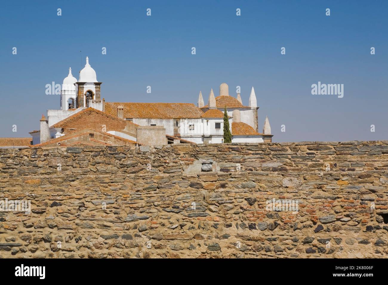 Terracotta roofed church inside the old castle walls in Monsaraz ...