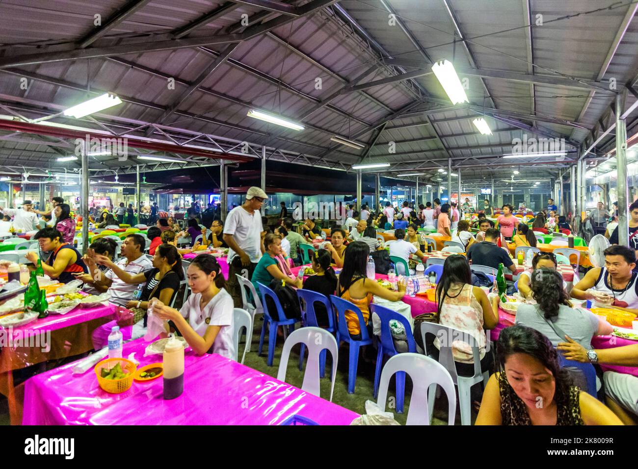Filipinos eating at a food park called Sugbo Mercado in Cebu City ...