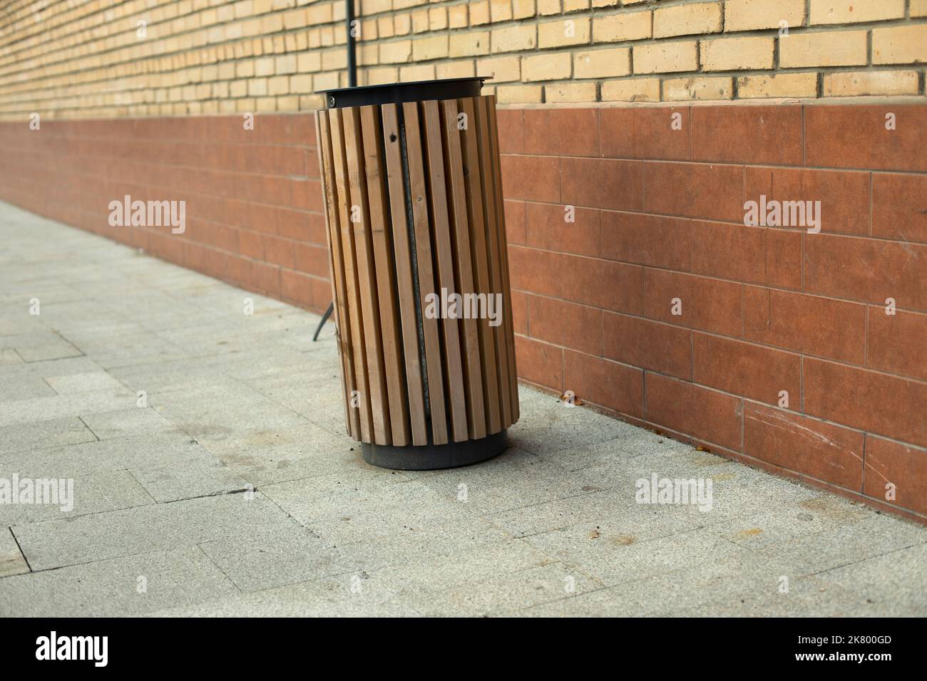 Garbage can on street. Waste tank. Garbage in city. Wooden container ...