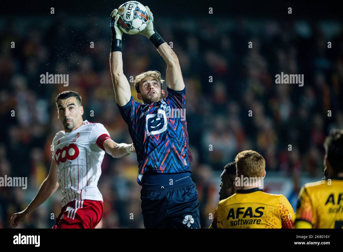 Mechelen's goalkeeper Gaetan Coucke fight for the ball during a soccer ...