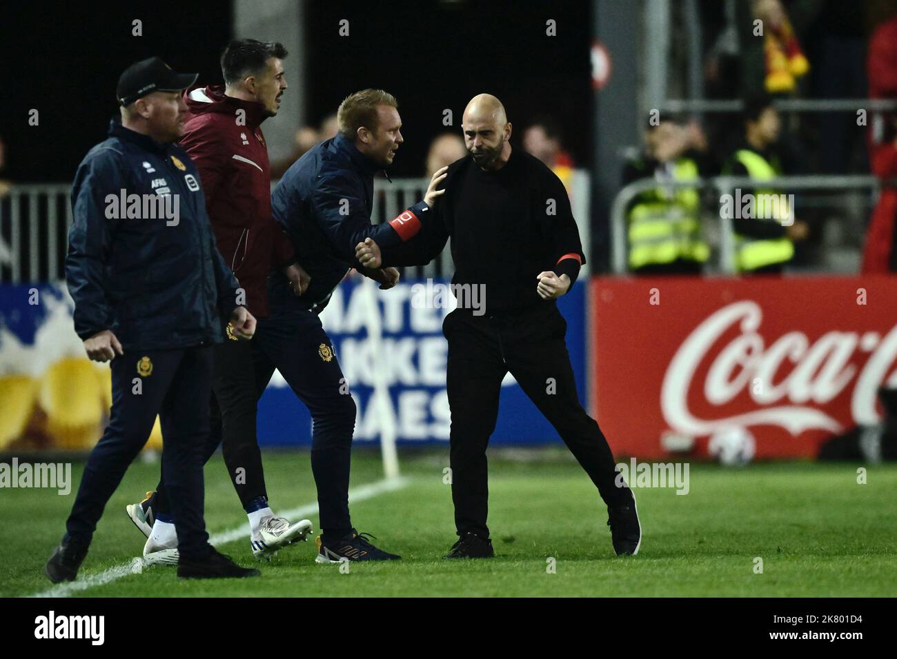 Mechelen's new head coach Steven Defour reacts after scoring during a ...