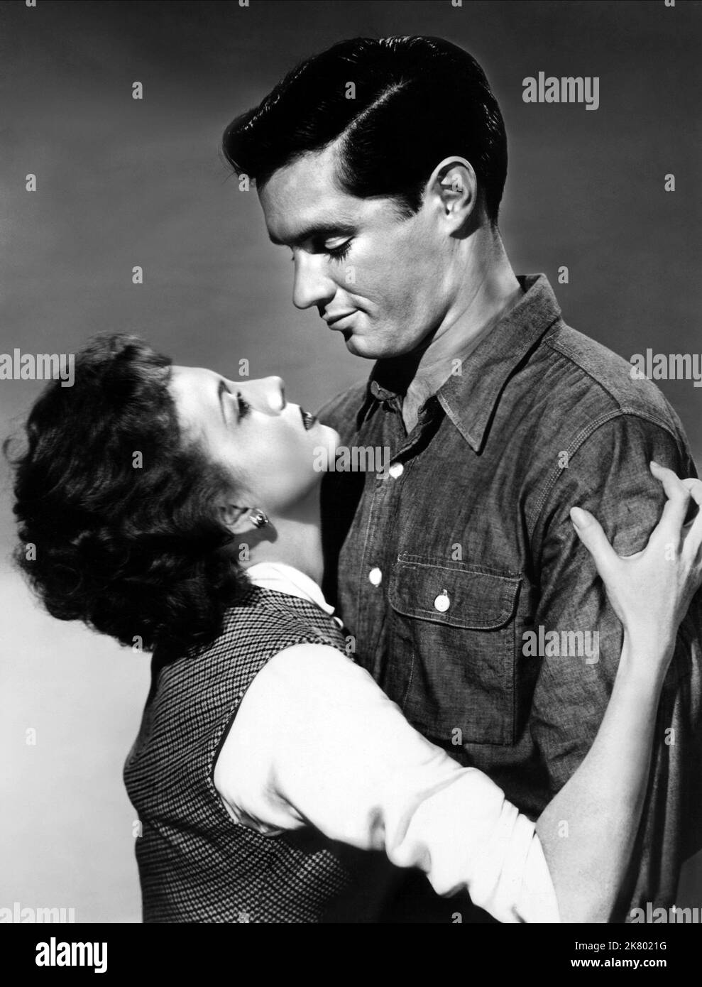 Betty Lynn & John Gavin Film: Behind The High Wall (USA 1956) Characters: Anne MacGregor, Johnny ...