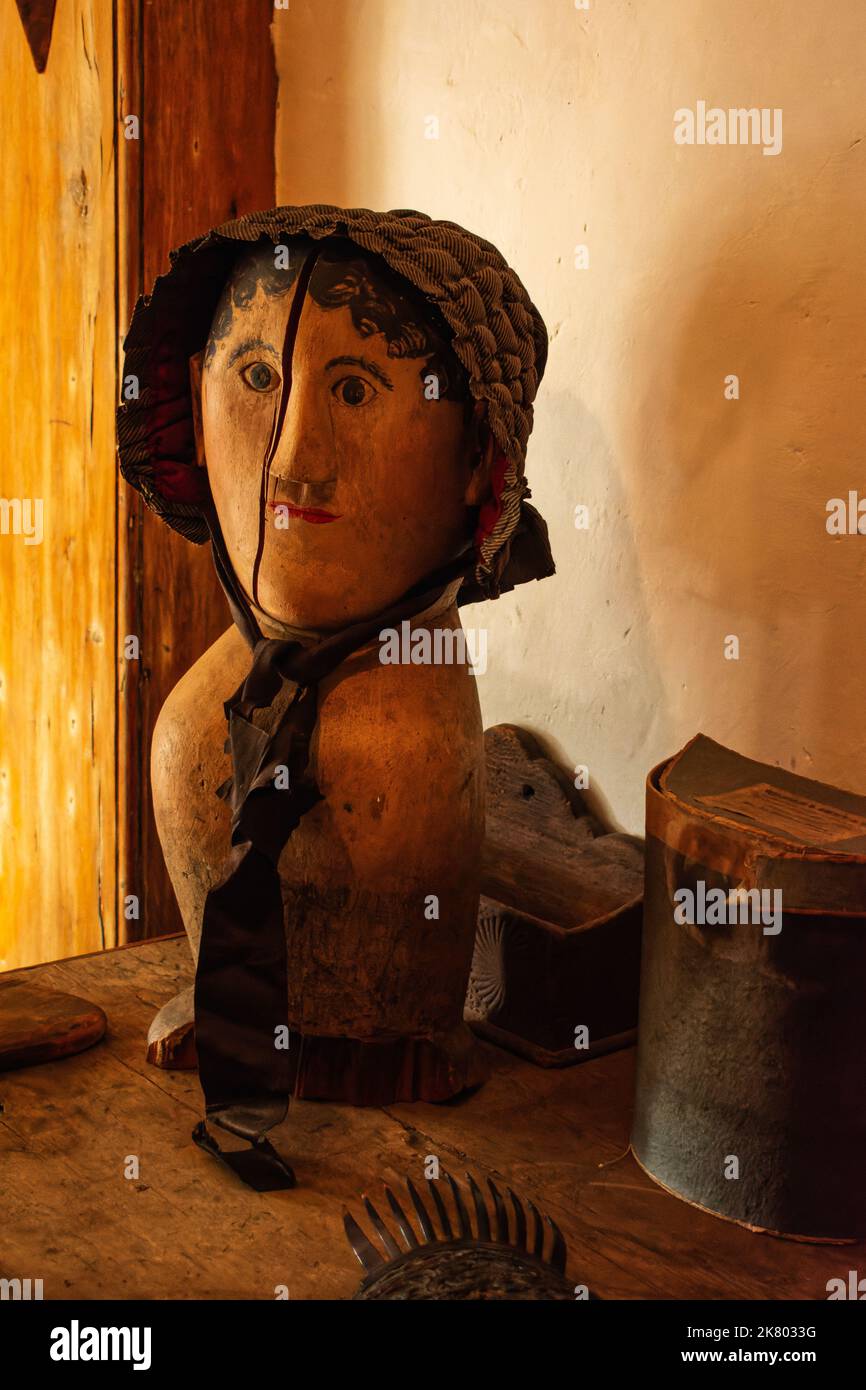 A carved wood head with a hat resting on a table at Cogswell's Grant in ...