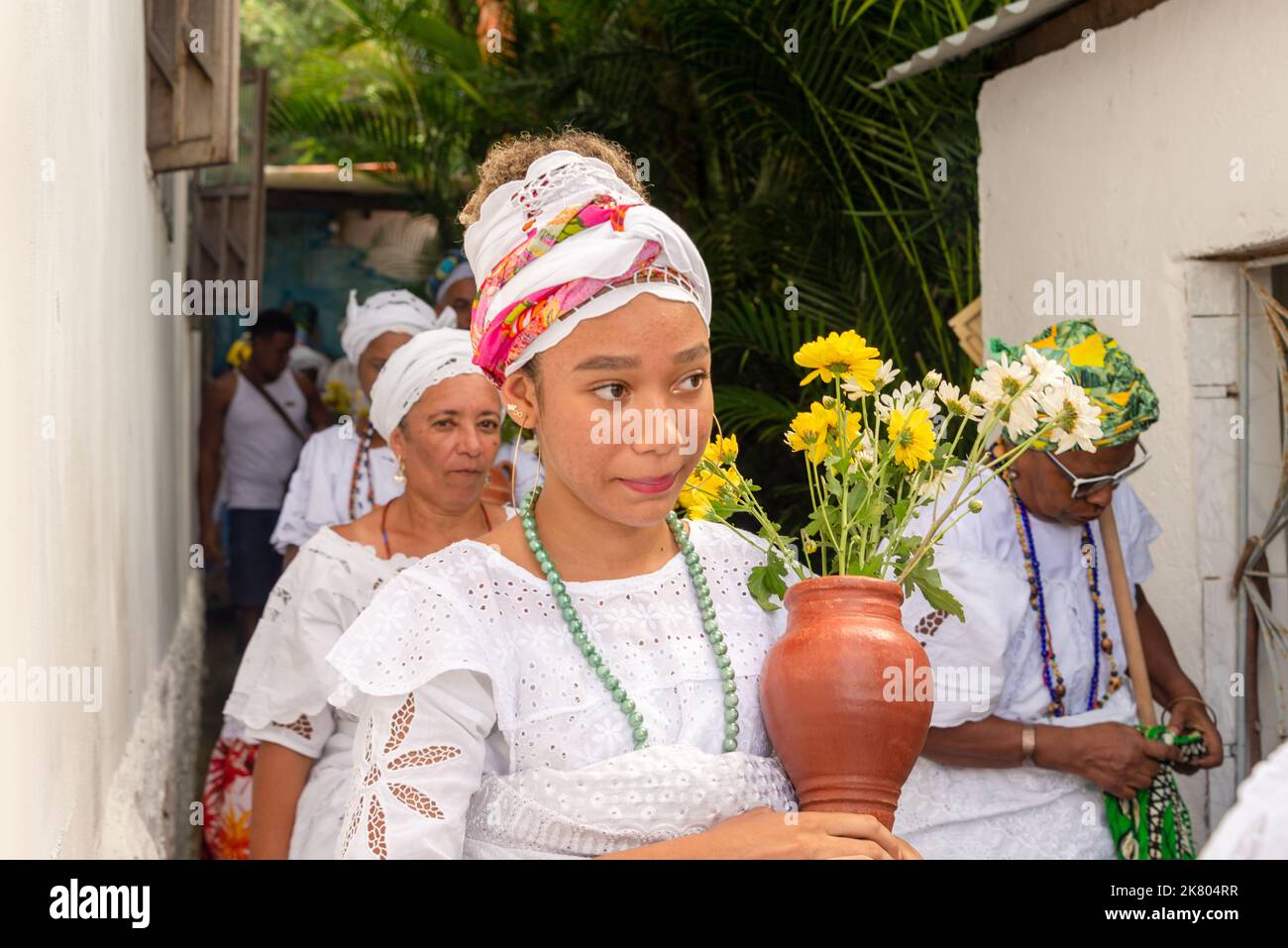 Candomblé members gathered in traditional clothing at the religious ...
