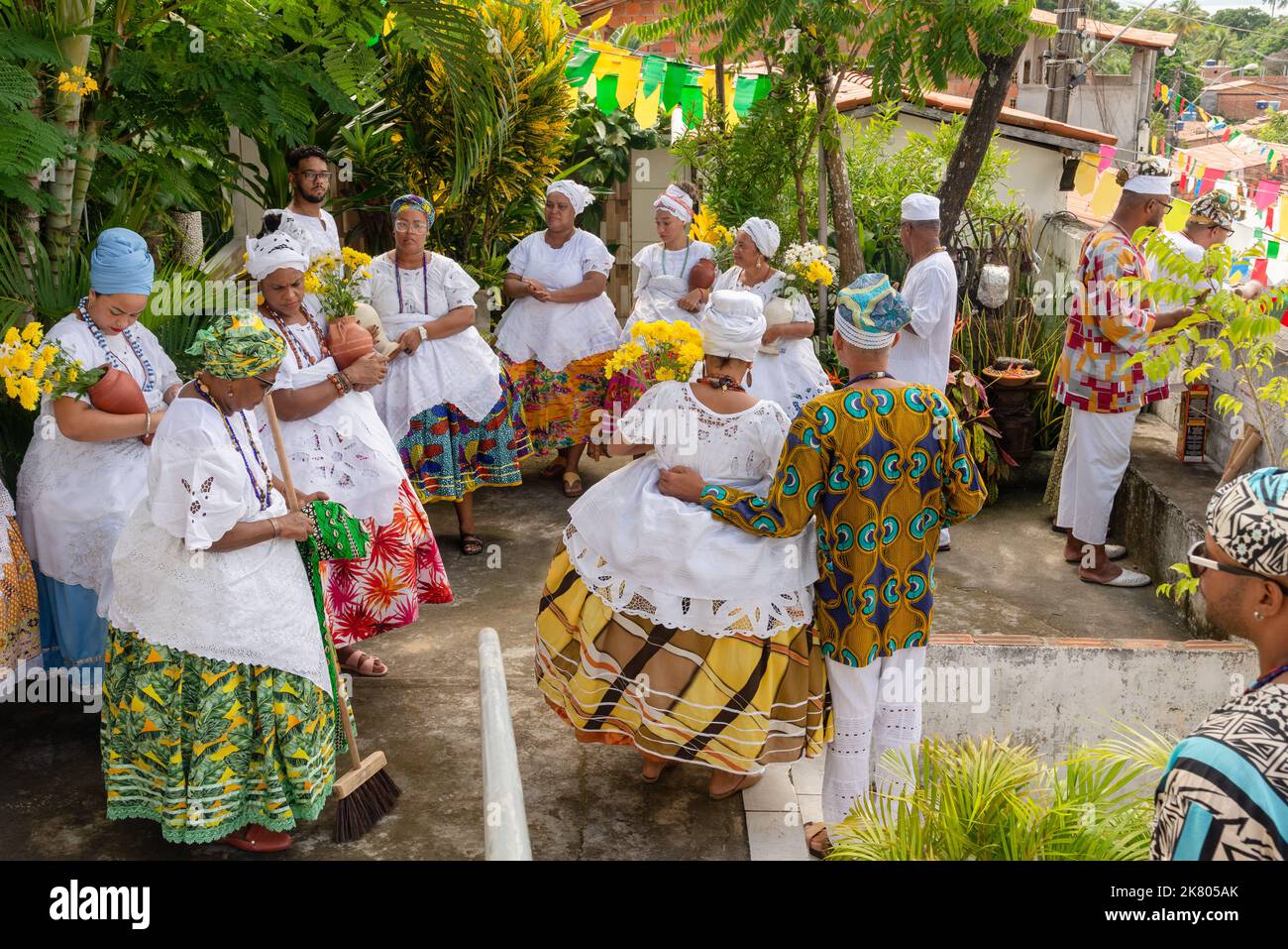 Candomblé members gathered in traditional clothing at the religious ...