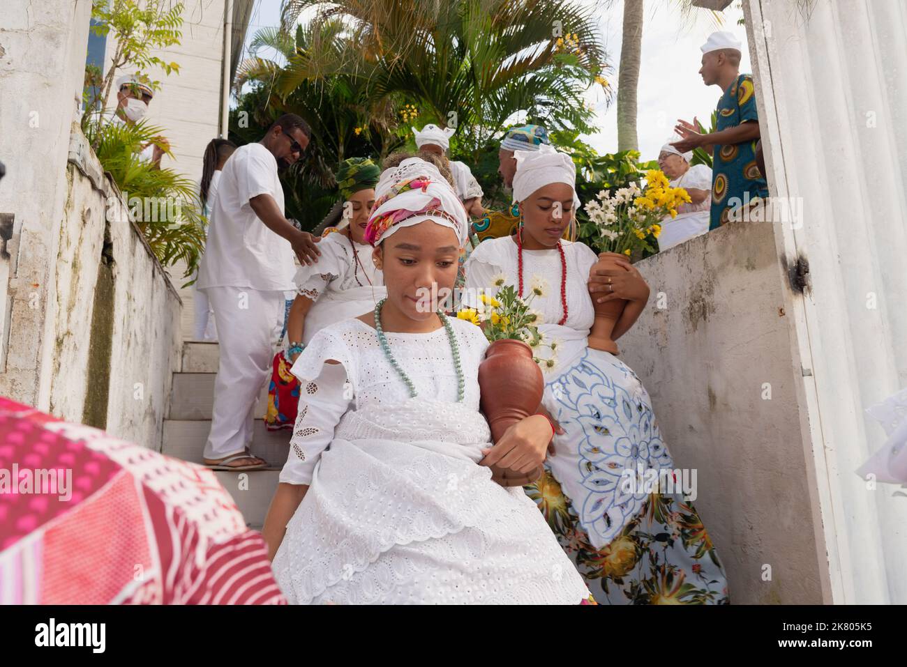 Candomblé members gathered in traditional clothing at the religious ...